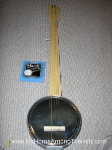 Cookie tin banjo | My Home Among The Hills